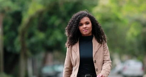 Confident black woman walking forward. E... | Stock Video | Pond5