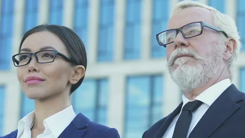 Confident business people looking afar, ... | Stock Video | Pond5