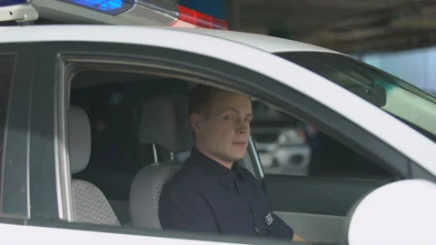 Confident male police officer looking at... | Stock Video | Pond5