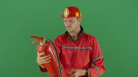 confused adult man firefighter reading t... | Stock Video | Pond5