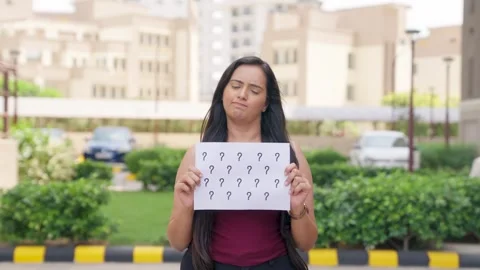 Confused Indian Woman standing with Ques... | Stock Video | Pond5