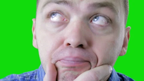 Confused Scared Man , Afraid. On green b... | Stock Video | Pond5