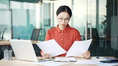 Confused young asian female employee hav... | Stock Video | Pond5