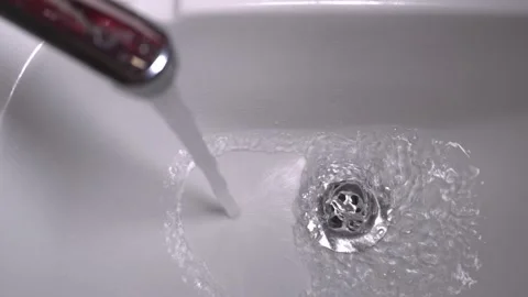 Congestion in sink . Water pours from wa... | Stock Video | Pond5