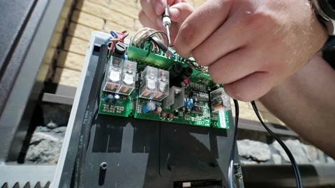 Connecting the automatic garage gate mec... | Stock Video | Pond5