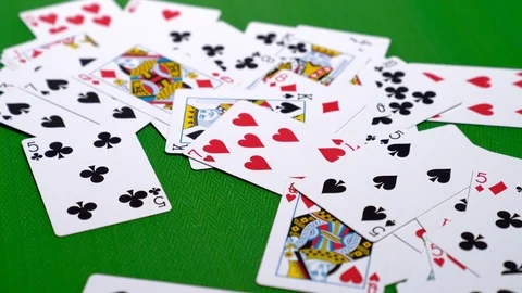 Consolidating a messy pile of poker card... | Stock Video | Pond5