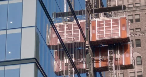 Construction Elevators Go Up and Down on... | Stock Video | Pond5