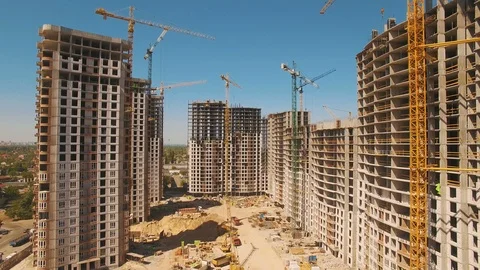 Construction of houses. Drone fly over c... | Stock Video | Pond5