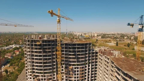 Construction of houses. Drone fly over c... | Stock Video | Pond5