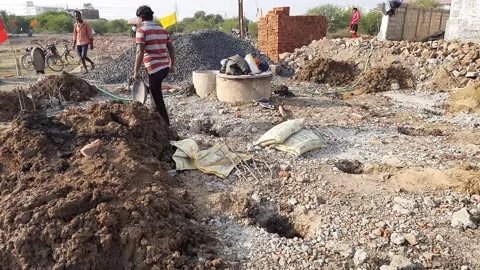 Construction Labour Team Digging a pile ... | Stock Video | Pond5