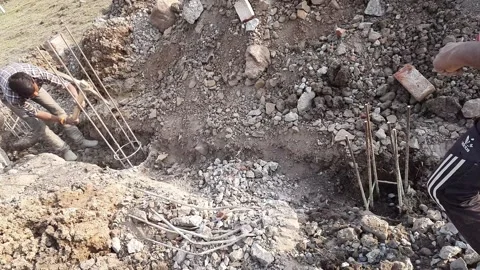 Construction Labour Team Digging a pile ... | Stock Video | Pond5
