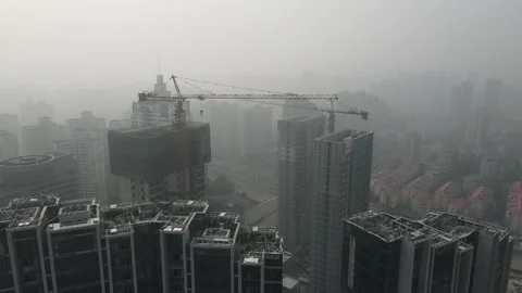 Construction site in heavy haze air poll... | Stock Video | Pond5
