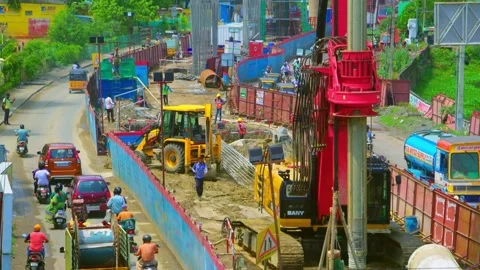 Construction work happening on a road us... | Stock Video | Pond5