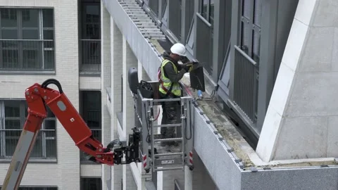 Construction Worker In Cherry Picker Usi... | Stock Video | Pond5