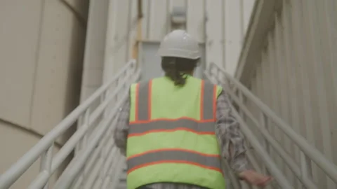 Construction Worker Walking Up Flight Of... | Stock Video | Pond5