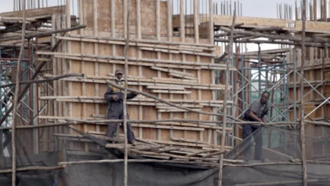 Construction workers doing dangerous wor... | Stock Video | Pond5