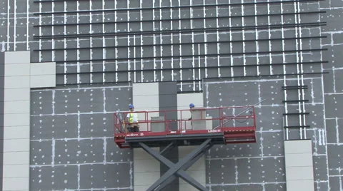 Construction workers on elevated platfor... | Stock Video | Pond5