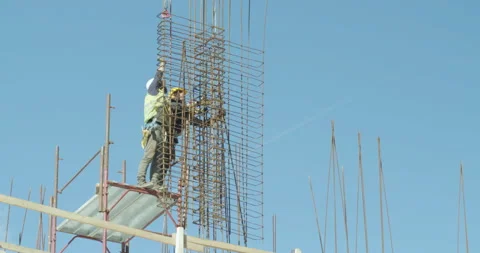 Construction workers install reinforcing... | Stock Video | Pond5
