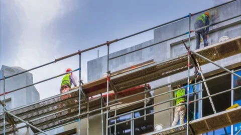 Construction workers perform facade work... | Stock Video | Pond5