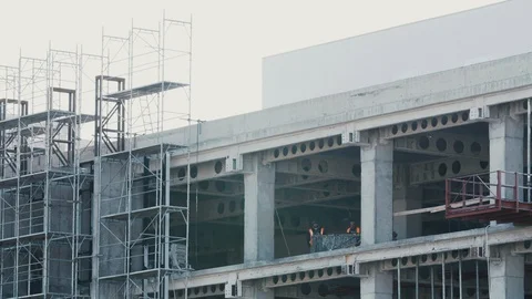 Construction workers pushing a container | Stock Video | Pond5