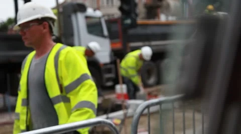 Construction workers repair road infrast... | Stock Video | Pond5