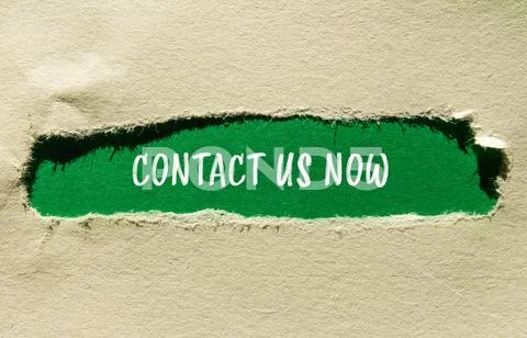 Contact us now words written on ripped paper with green background ...
