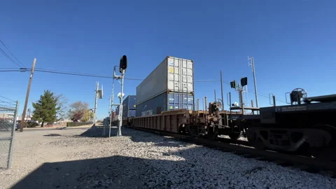 Container freight train passes through i... | Stock Video | Pond5