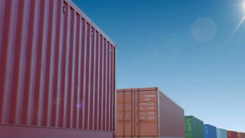 Containers Stream on Blue Sky Background... | Stock Video | Pond5