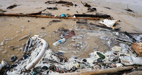 Contaminated water with debris and plast... | Stock Video | Pond5