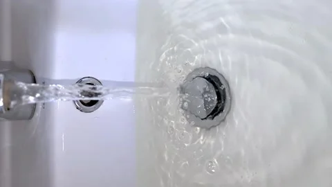 Contaminated water flowing from tap in b... | Stock Video | Pond5