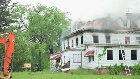 Controlled burn of house for educational... | Stock Video | Pond5