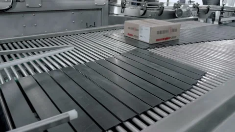 Conveyor belt with flow control for diff... | Stock Video | Pond5