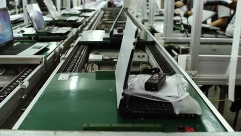 Conveyor Belt with Laptop Computers in E... | Stock Video | Pond5
