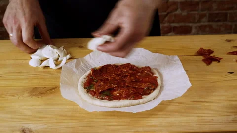 The cook adding slices of cheese mozzare... | Stock Video | Pond5