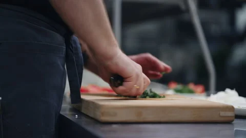 Cook Chopping Greenery For Salad In Rest... | Stock Video | Pond5