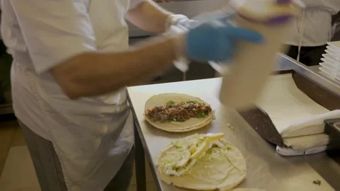Cook in the process of making shawarma a... | Stock Video | Pond5