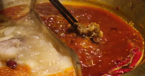 cooking beef in boiling Chinese hotpot | Stock Video | Pond5