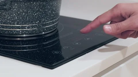 Cooking induction panel with touch contr... | Stock Video | Pond5