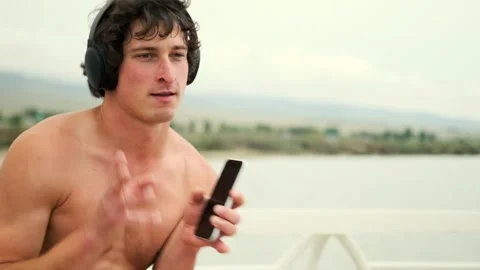 Cool handsome shirtless guy dancing with... | Stock Video | Pond5