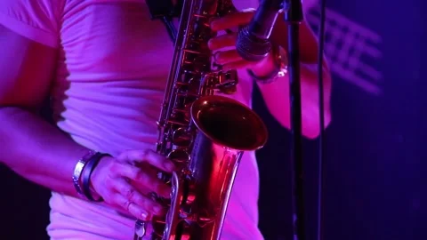 Cool saxophone player performing a solo ... | Stock Video | Pond5