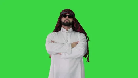 Cool sheikh in sunglasses posing looking... | Stock Video | Pond5
