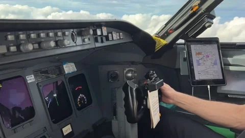 Copilot handling flight controls of a mo... | Stock Video | Pond5