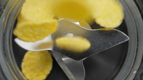 Corn flakes pouring in blender. Close-up... | Stock Video | Pond5