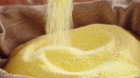 Corn flour texture close-up, cornmeal to... | Stock Video | Pond5