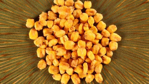 Corn nuts 4k video spinning clockwise sl... | Stock Video | Pond5