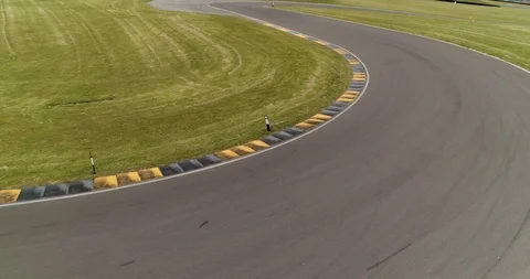 Corner on race track with curb and tyre ... | Stock Video | Pond5