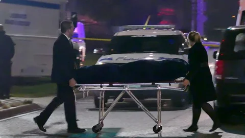Coroners Transporting Body On Stretcher ... | Stock Video | Pond5