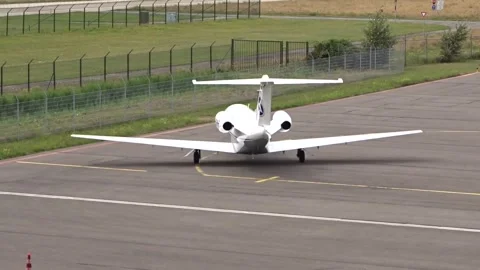 Corporate jet Turning left to right on t... | Stock Video | Pond5