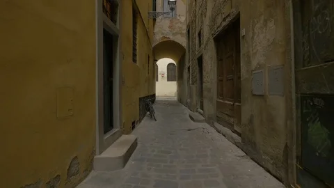 A corridor between two old buildings | Stock Video | Pond5