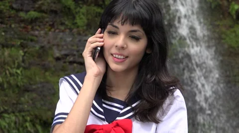 Cosplay Woman Talking On Cell Phone | Stock Video | Pond5